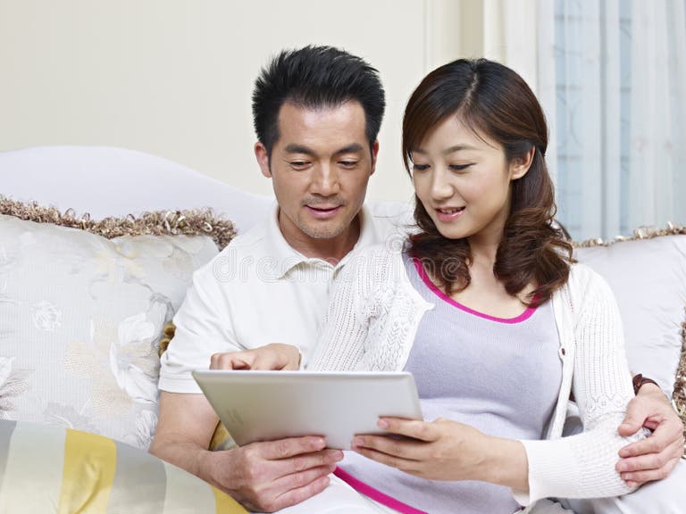 Young couple stock photo. Image of games, cuddling, internet - 32991376