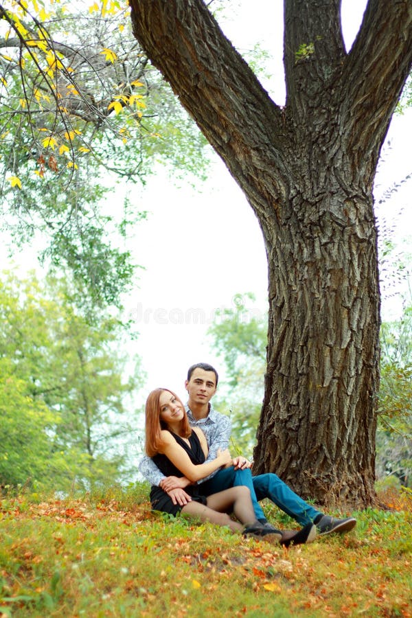 Young Couple in Autumn Park Stock Photo - Image of charming, feeling ...