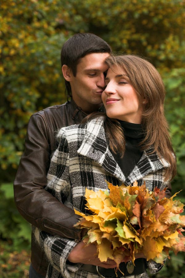 Young Couple in Autumn Park Stock Image - Image of person, outdoors ...
