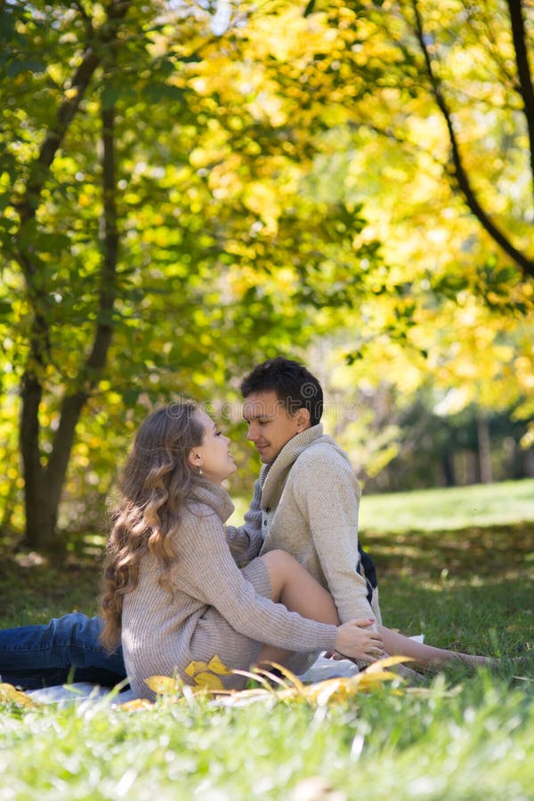 Young Couple in Autumn Park Stock Image - Image of couple, pretty ...