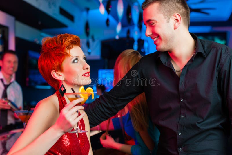 Young Couple in Bar or Club Drinking Cocktails Stock Photo - Image of ...
