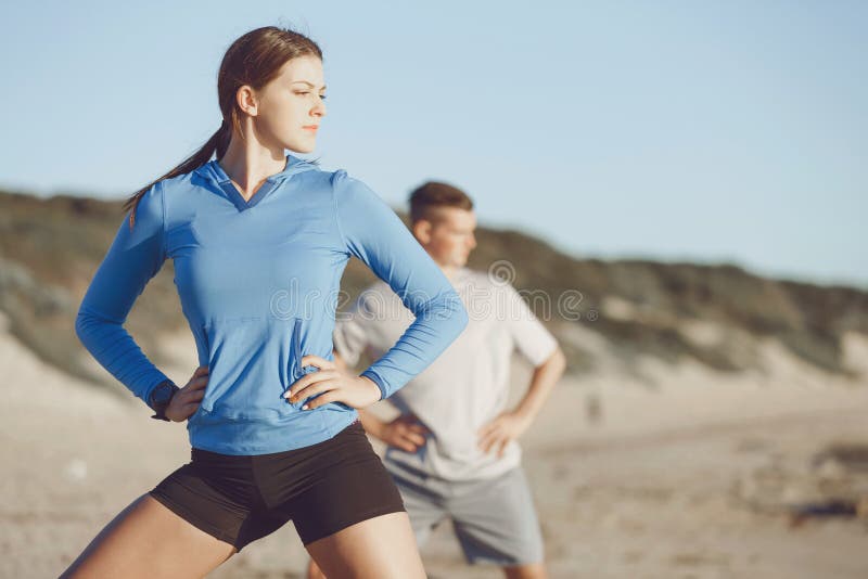 Young Couple on Beach Training Together Stock Photo - Image of health ...