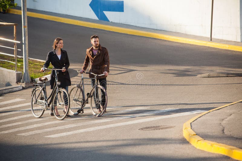 Young Couple with a Bicycle Opposite City Stock Image - Image of ...