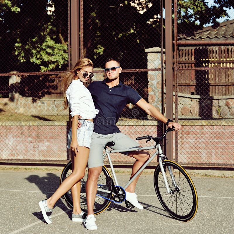 Young Couple with a Bicycle Outdoor Stock Image - Image of break ...
