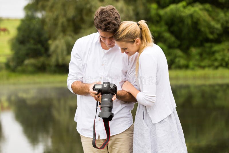 Young couple camera stock image. Image of handsome, nature - 50962883