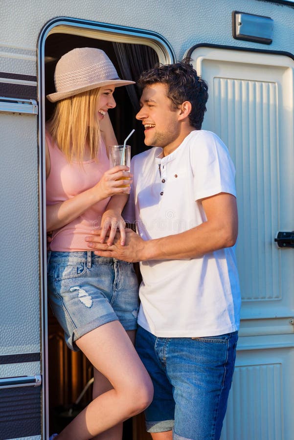 Young Couple with a Camper Van Stock Photo - Image of freedom ...
