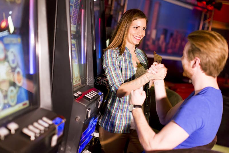 Young couple in the casino stock photo. Image of games - 78326984