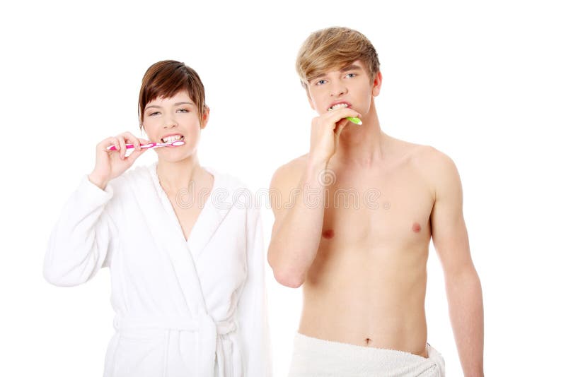 Young Couple Cleaning Teeth Together. Stock Image - Image of female ...