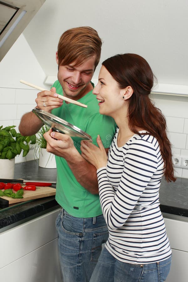 Young Couple Cooking in the Kitchen Stock Photo - Image of friends ...