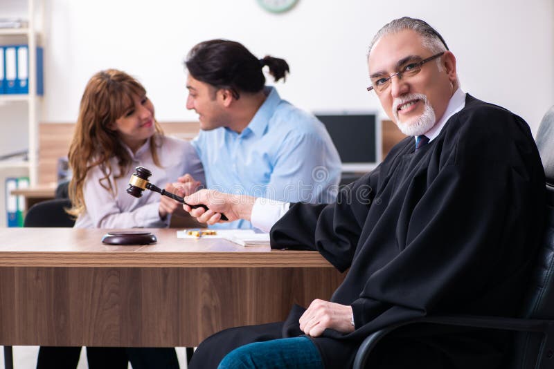 Young Couple in the Courthouse in Divorce Concept Stock Photo - Image ...
