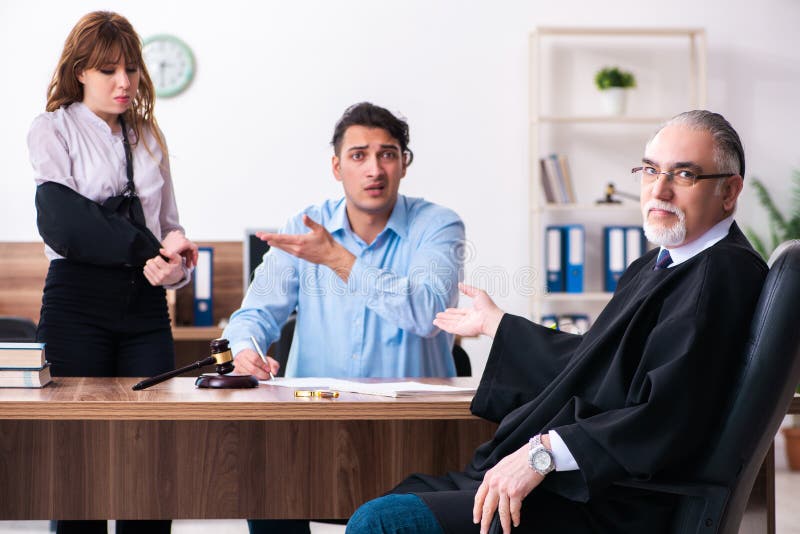 Young Couple in the Courthouse in Divorce Concept Stock Image - Image ...
