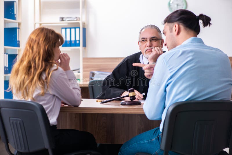 Young Couple in the Courthouse in Divorce Concept Stock Image - Image ...