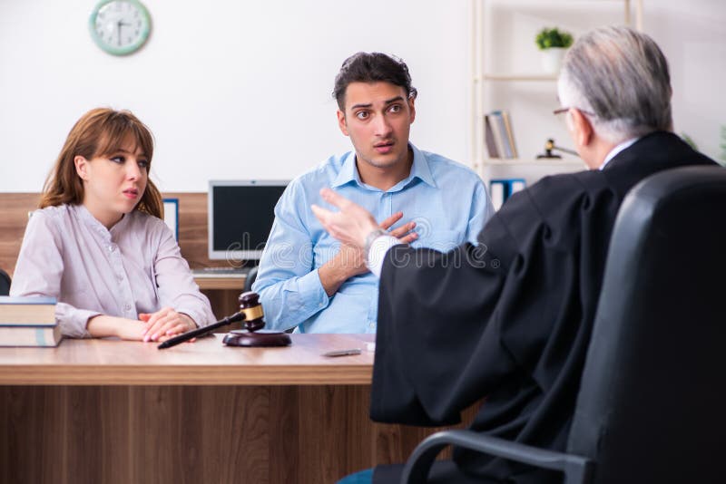 Young Couple in the Courthouse in Divorce Concept Stock Photo - Image ...