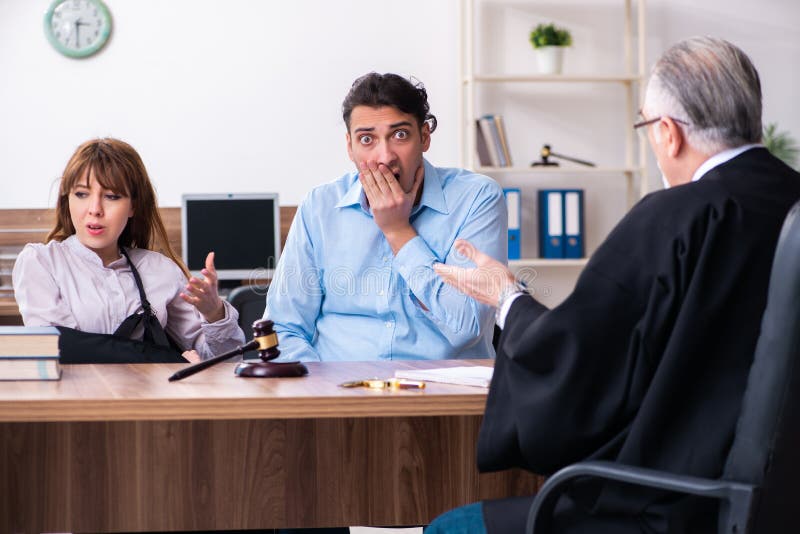 Young Couple in the Courthouse in Divorce Concept Stock Image - Image ...