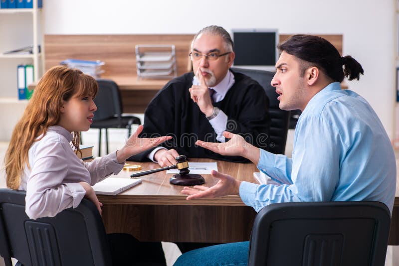 Young Couple in the Courthouse in Divorce Concept Stock Photo - Image ...