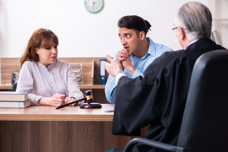 Young Couple in the Courthouse in Divorce Concept Stock Image - Image ...