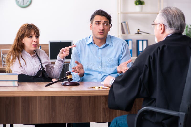 Young Couple in the Courthouse in Divorce Concept Stock Photo - Image ...
