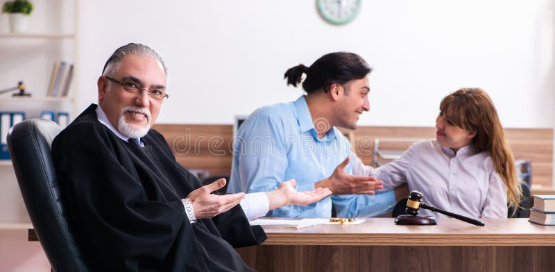 Young Couple in the Courthouse in Divorce Concept Stock Image - Image ...