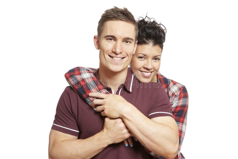 Young Couple Cuddling and Smiling Stock Image - Image of mixed, smiling ...