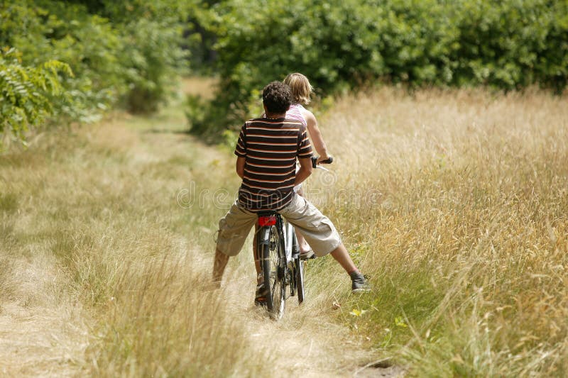 Young couple cycling stock image. Image of complicity - 8987075