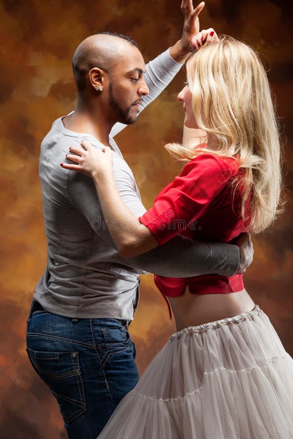 Young Couple Dances Caribbean Salsa Stock Photo - Image of adult ...