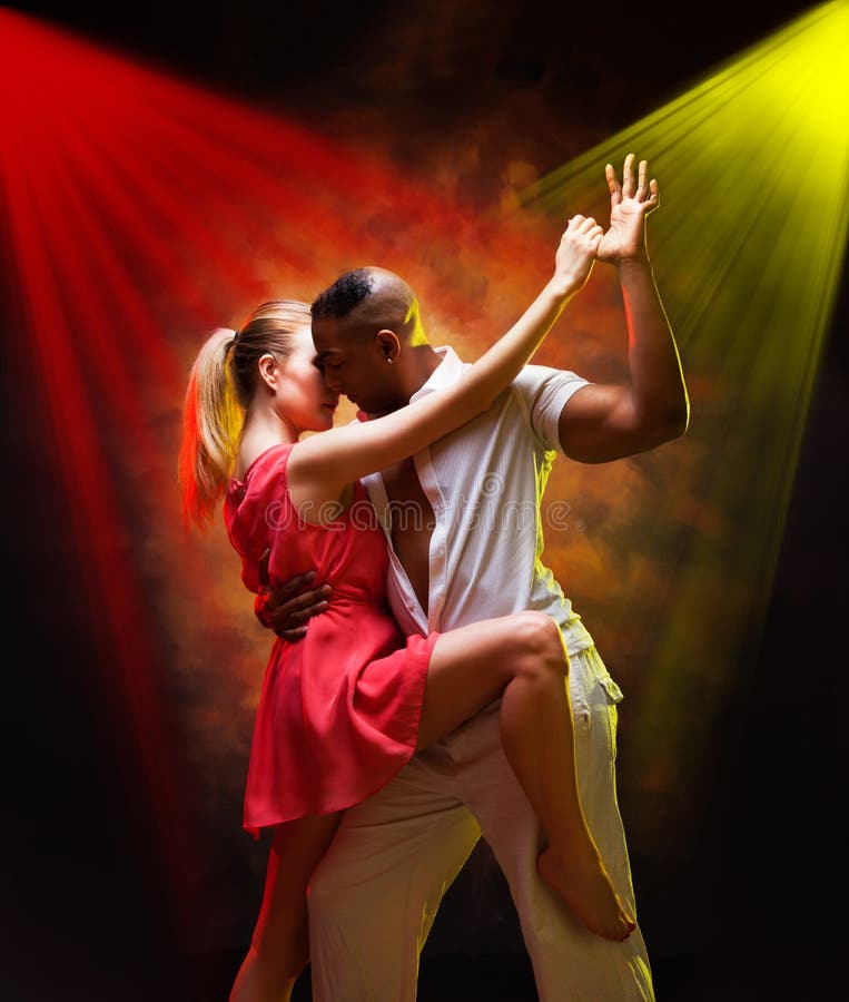 Young Couple Dances Caribbean Salsa Stock Photo - Image of fashion ...