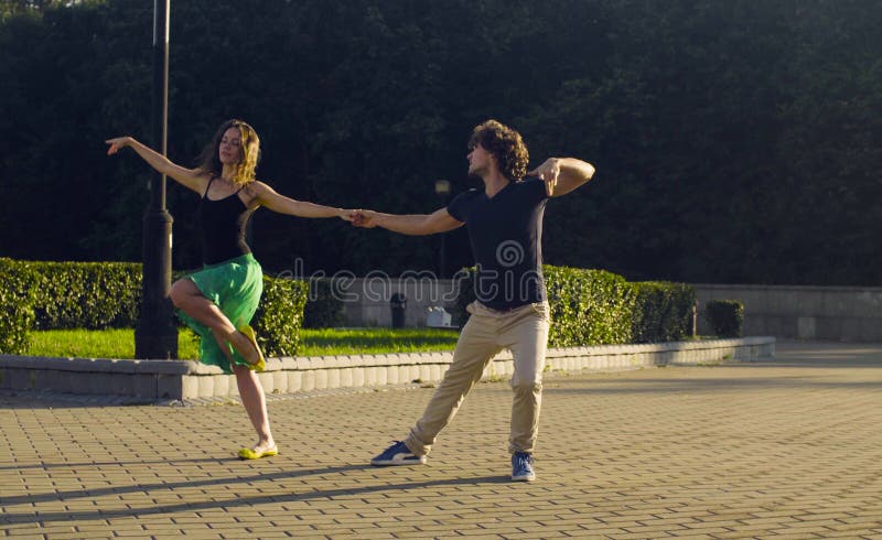 Young Couple Dancing on the Square Stock Photo - Image of outdoors ...