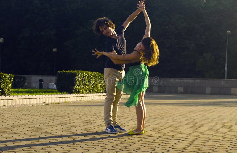 Young Couple Dancing on the Square Stock Photo - Image of acrobatics ...