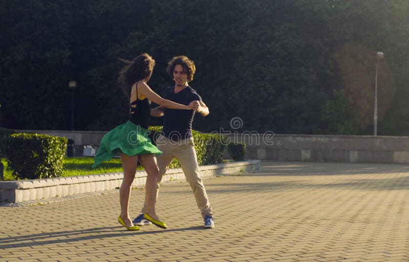 Young Couple Dancing on the Square Stock Image - Image of dance, long ...