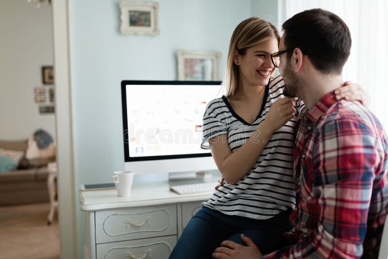Young Couple of Designers Working on Computer Stock Image - Image of ...