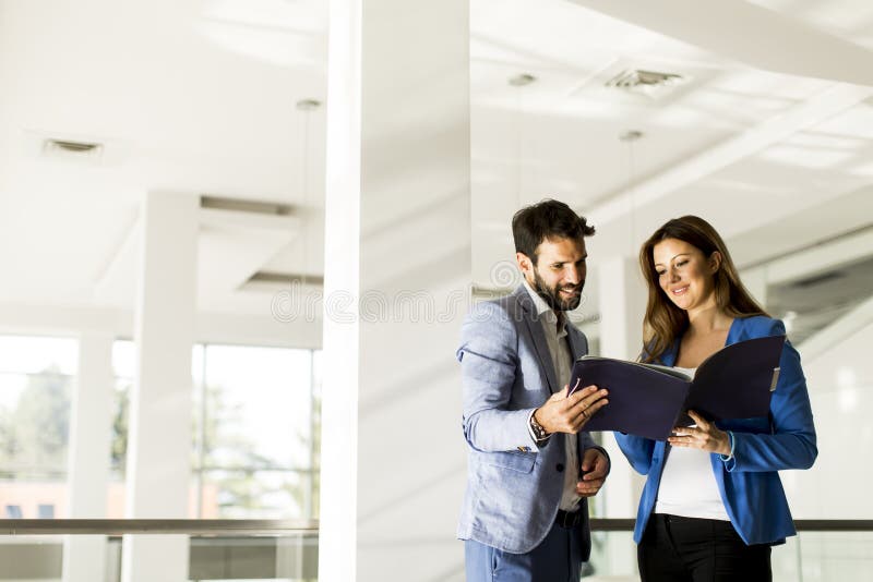 Young couple discussing stock photo. Image of finance - 87088902