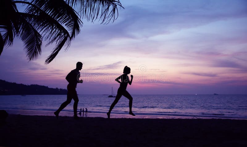 Jogging on a Tropical Sandy Beach Near Sea / Ocean Stock Photo - Image ...