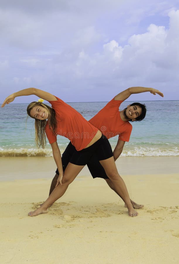 Young Couple Doing Yoga, Exercise Stock Photo - Image of blond, pretty ...