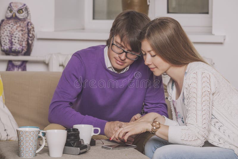 Young Couple Drinking Tea in the Discussion of Ideas Stock Image ...