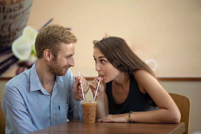 Sharing milkshake stock photo. Image of girlfriend, husband - 112804698