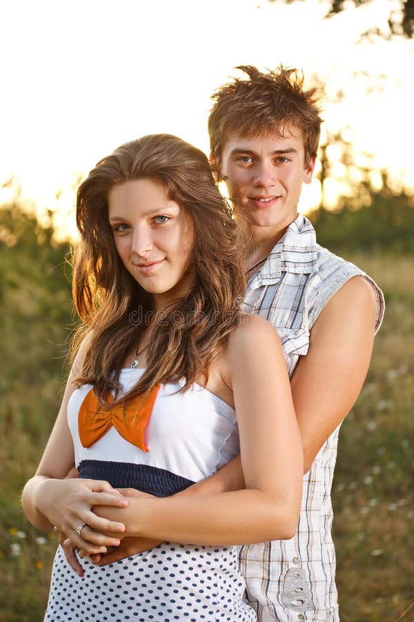 Young couple stock photo. Image of love, meadow, couple - 34035334