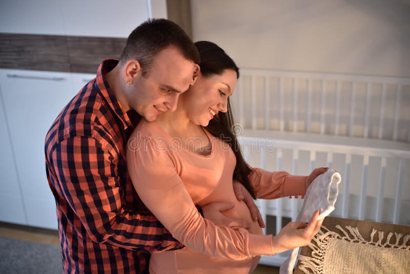 Young Couple Expecting a Baby Stock Photo - Image of male, expecting ...