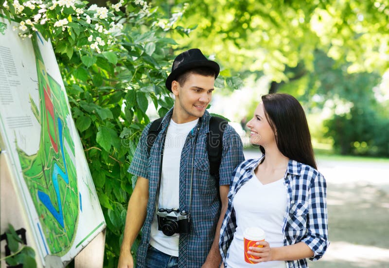 Young Couple Exploring the Park S Map Stock Image - Image of outdoor ...