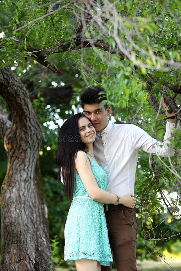Young Couple on the First Date Stock Image - Image of park, green ...