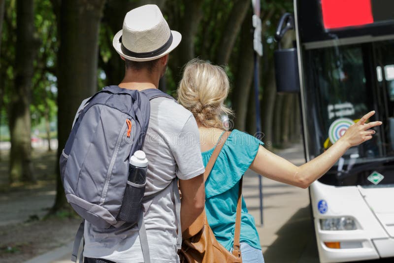 Young Couple Getting into Bus Stock Photo - Image of travel, love ...