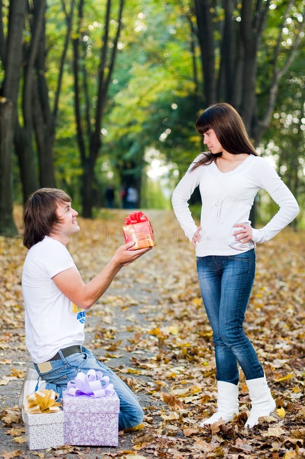 Young Couple with Gift Boxes Stock Photo - Image of adult, couple: 8842554