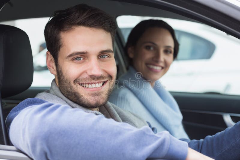 Young Couple Going for a Drive Stock Photo - Image of shoulders ...