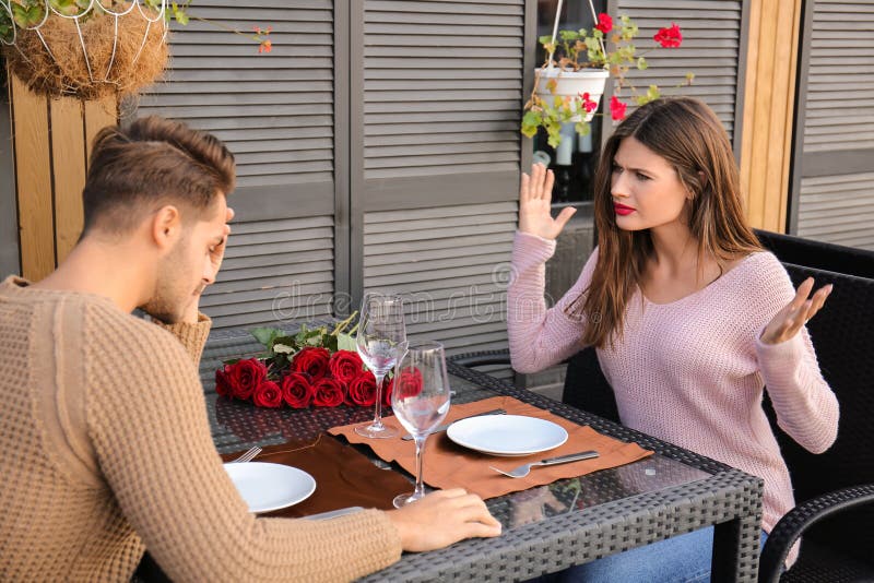 Young Couple Having Arguments on Date in Cafe Stock Photo - Image of ...