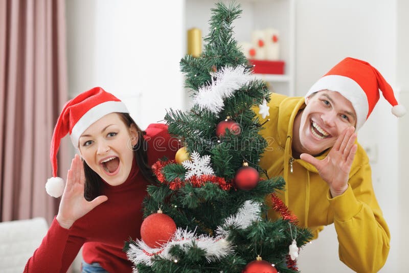 Young Couple Having Fun Christmas Time Stock Image - Image of domestic ...