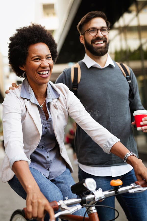 Young Couple Having Fun in the City and Ride a Bicycle Stock Image ...