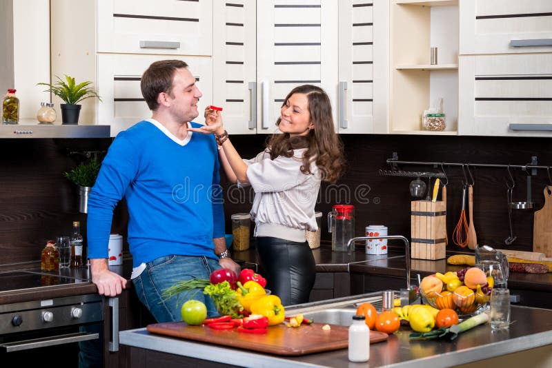 Young Couple Having Fun in the Kitchen Stock Image - Image of beautiful ...