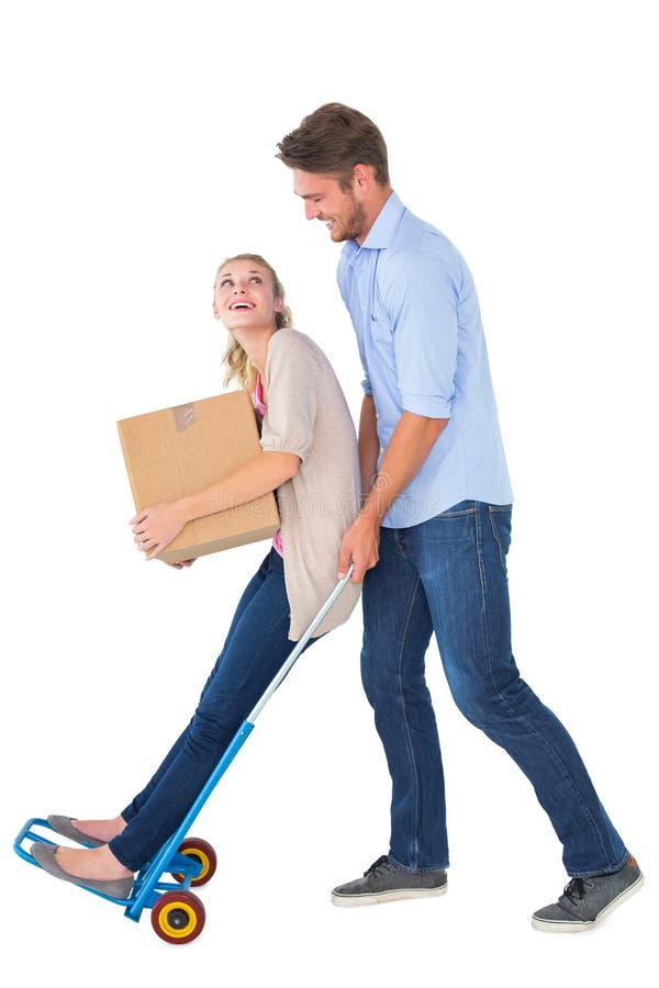Young Couple Having Fun Moving Trolley Stock Photos - Free & Royalty ...