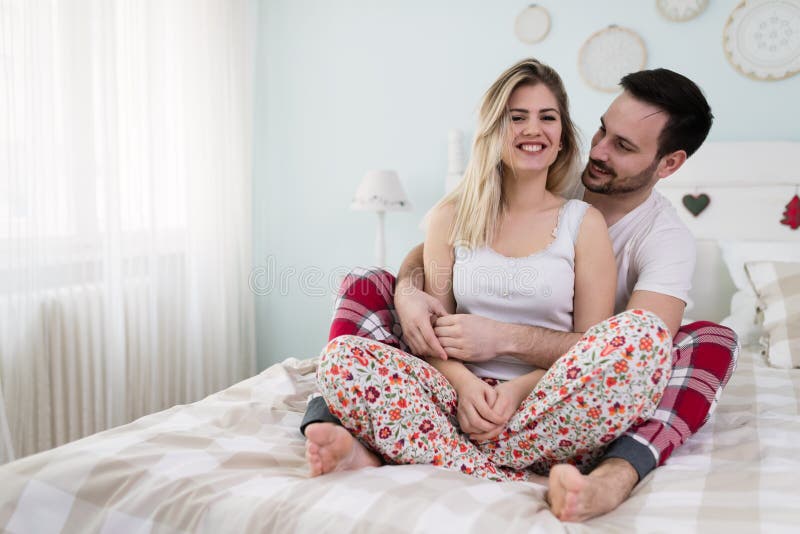 Young Couple Having Romantic Time in Bedroom Stock Image - Image of ...