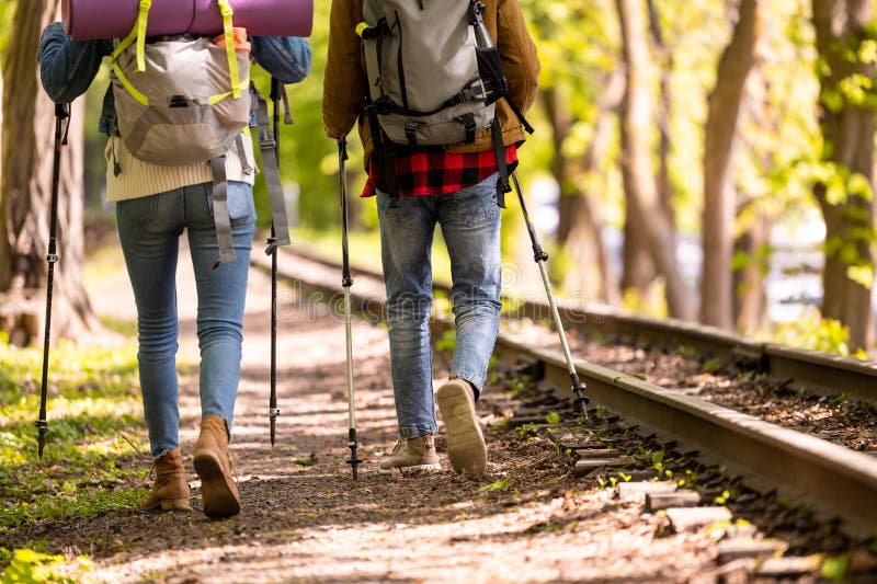 Young Couple Having a Walk in the Park Stock Photo - Image of sports ...