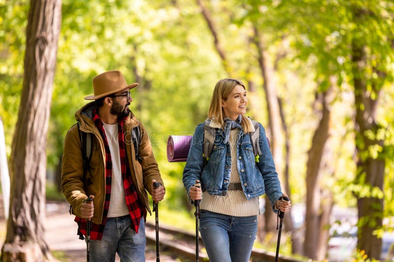 Young Couple Having a Walk in the Park Stock Image - Image of sports ...